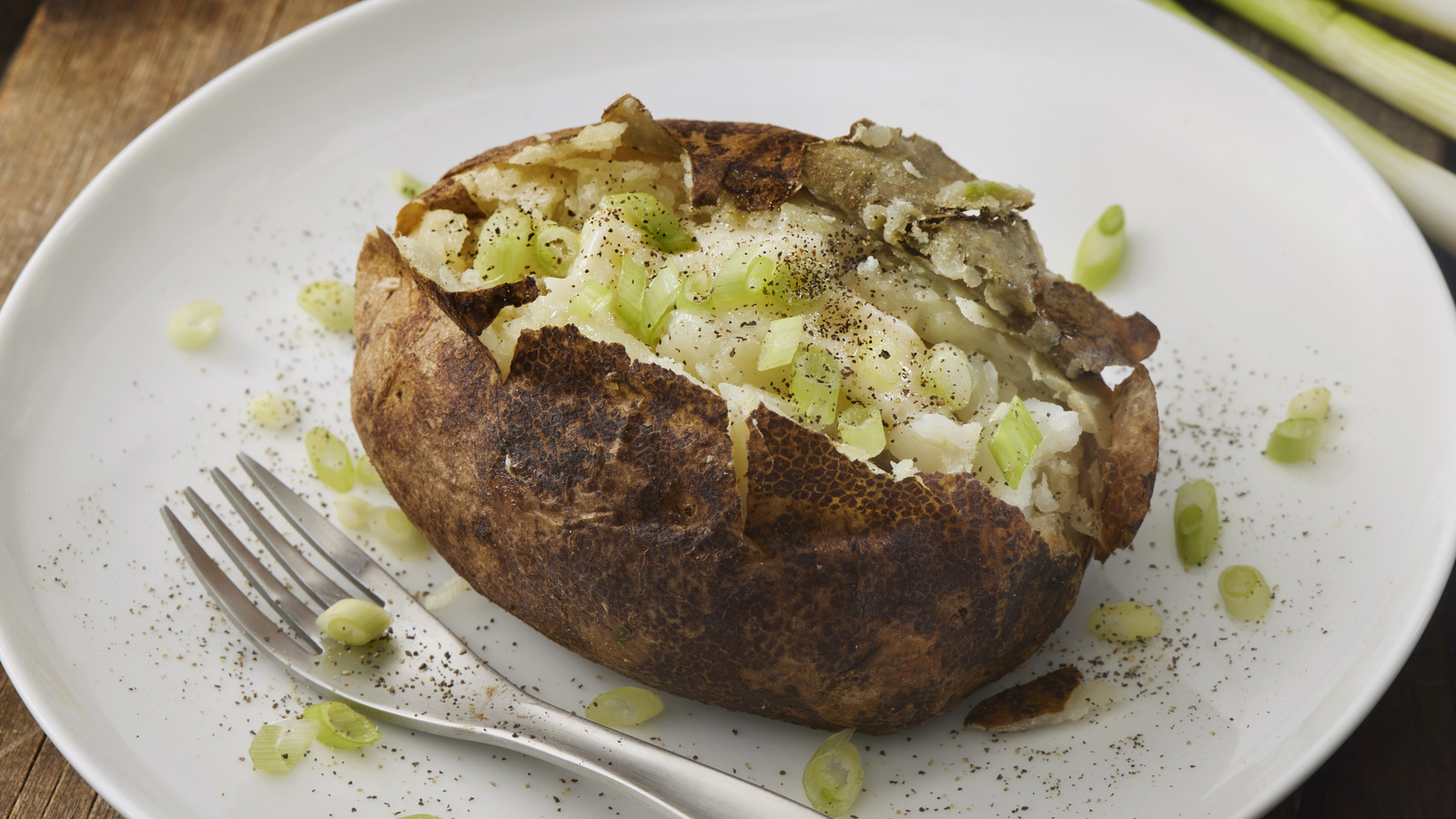 A Brushing Of Butter And Salt Makes For Tastier Skins On Baked Potatoes