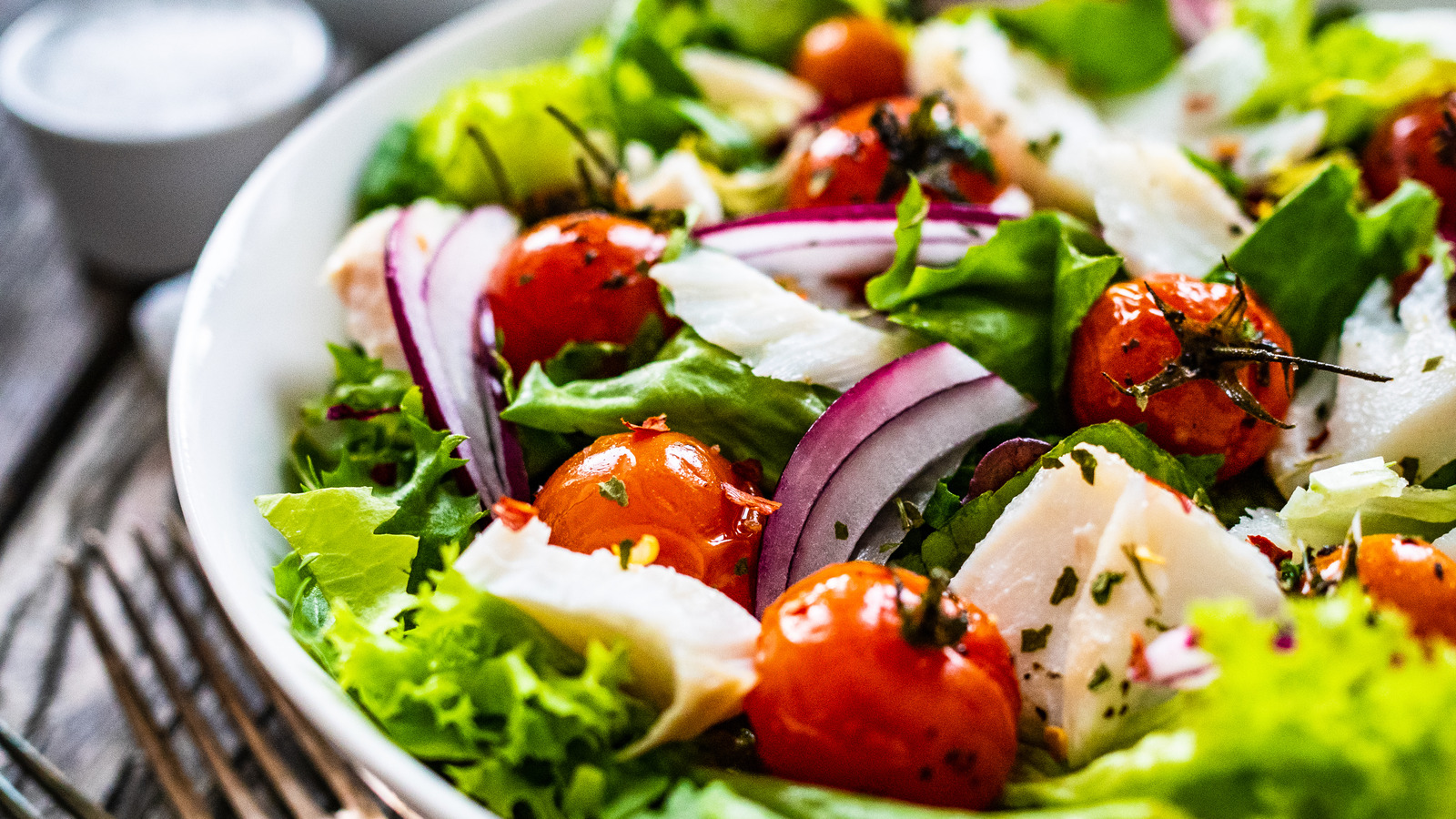 Add These Curly Greens To Bring Tasty Bitter Notes To Your Salads