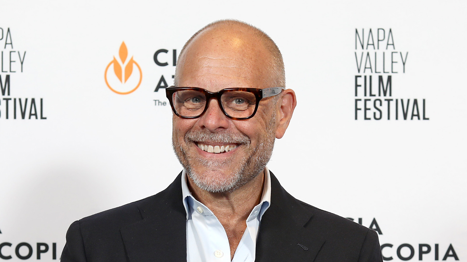 Alton Brown's Tip For Evenly Cooked Over-Easy Eggs Every Time