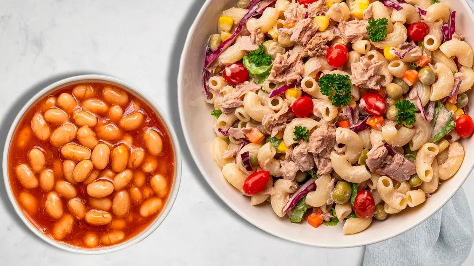 Canned Baked Beans Will Turn Your Potluck Macaroni Salad Up A Notch