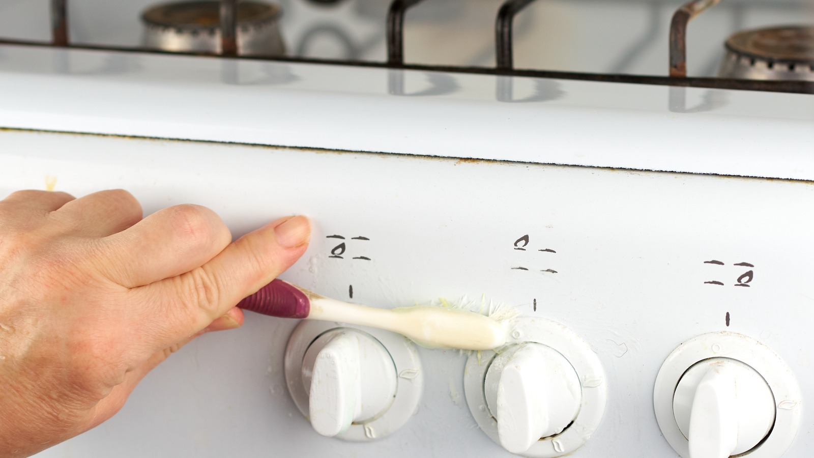 Use A Toothbrush To Clean Your Oven's Hard-To-Reach Areas