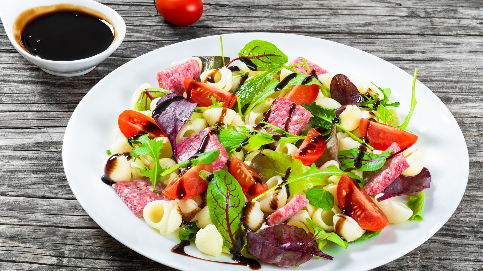 Elevate Your Pasta Salad With A Drizzle Of Spicy And Sweet Glaze