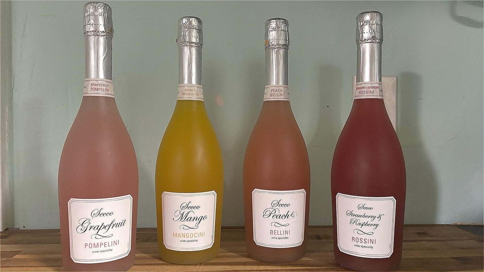Trader Joe's Secco Bellini Flavors Ranked From Worst To Best