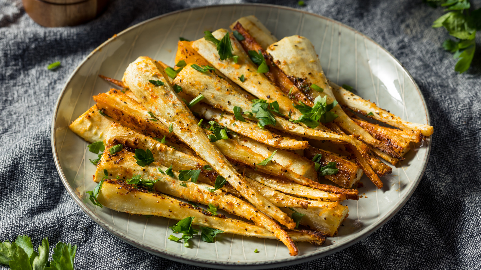 Flavor Roasted Parsnips With A Sprinkle Of Parmesan Cheese