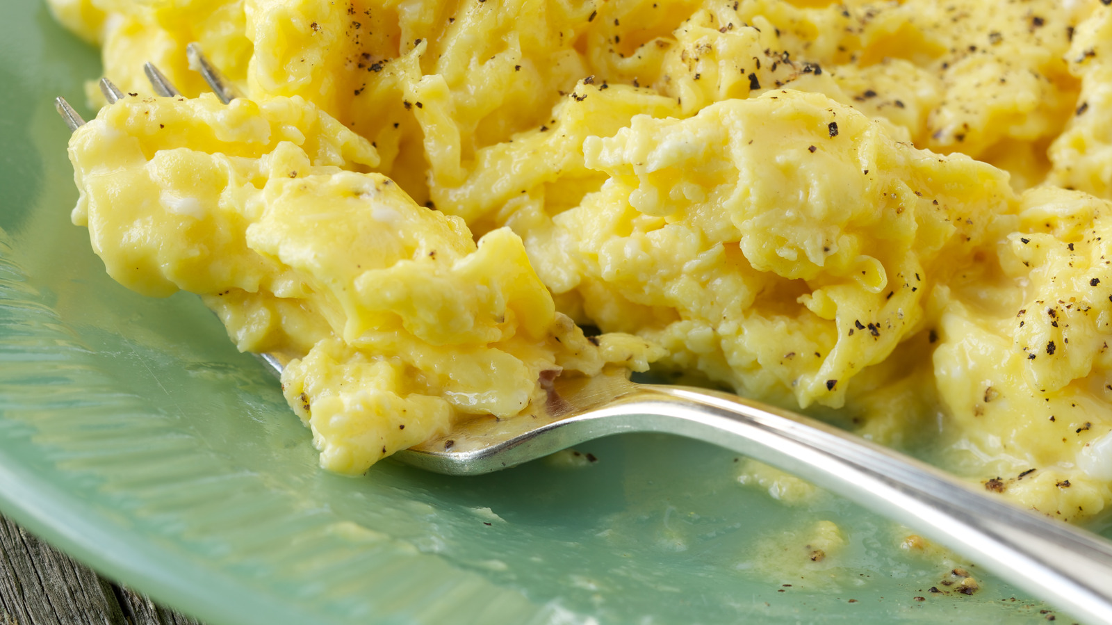 For Extra Creamy Scrambled Eggs, Save Some Of The Raw Mixture