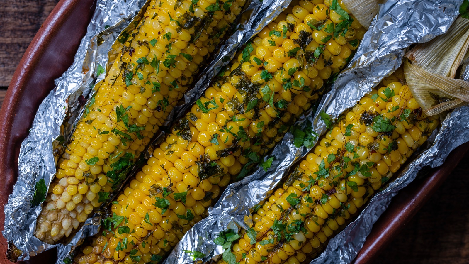 For Juicy And Flavorful Corn, Start Grilling Cobs In Foil