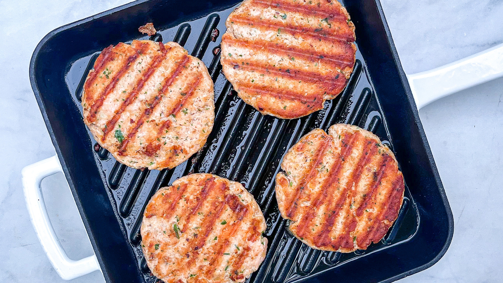 For The Best Salmon Burger Patties, Get Creative With Your Seasoning