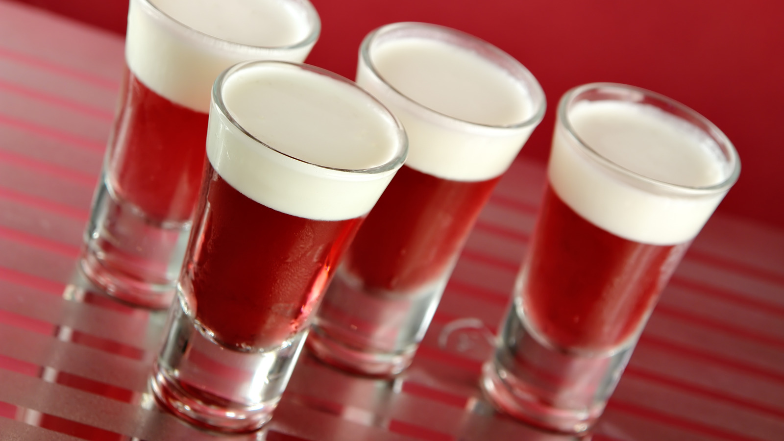 Give Jell-O Shots A Creamy Upgrade With A Layer Of Condensed Milk