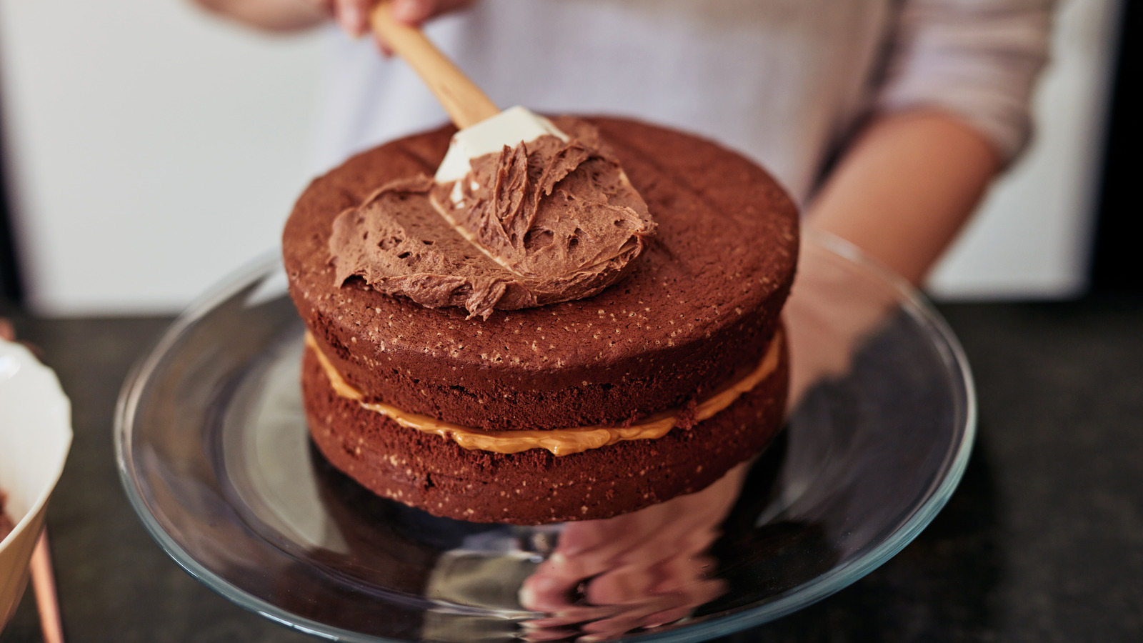 How Much Store-Bought Frosting You Actually Need For Your Cake