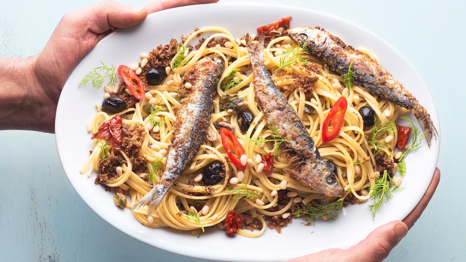 Give Your Box Of Raisins A Hot Wine Bath For A Sicilian-Style Pasta Topping