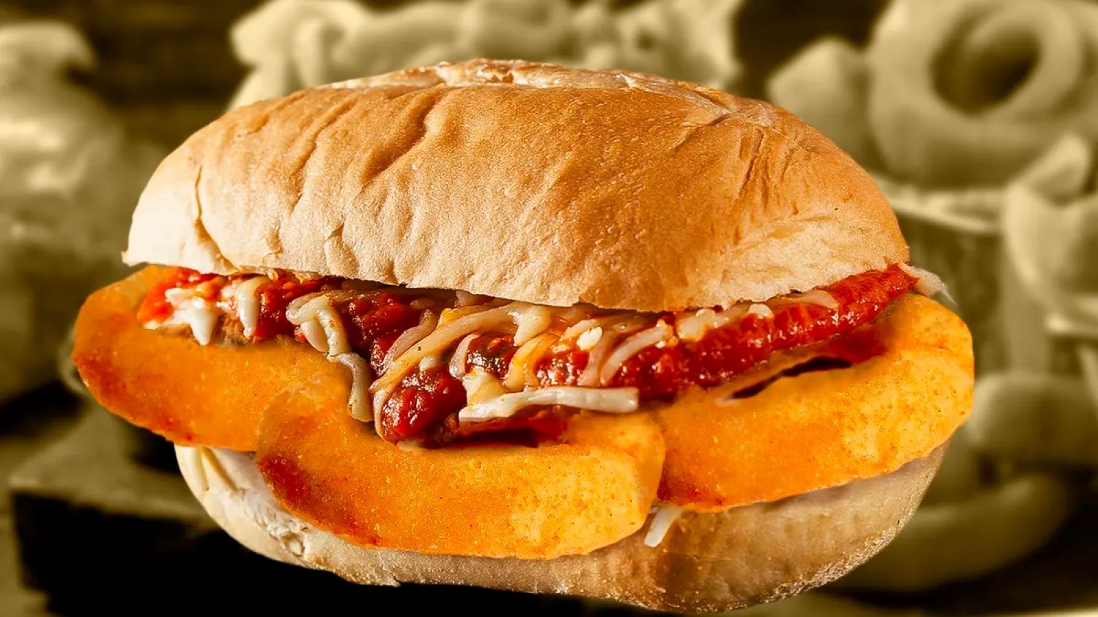 Onion Rings Are The Ideal Ingredient For A Vegetarian Parm Sandwich