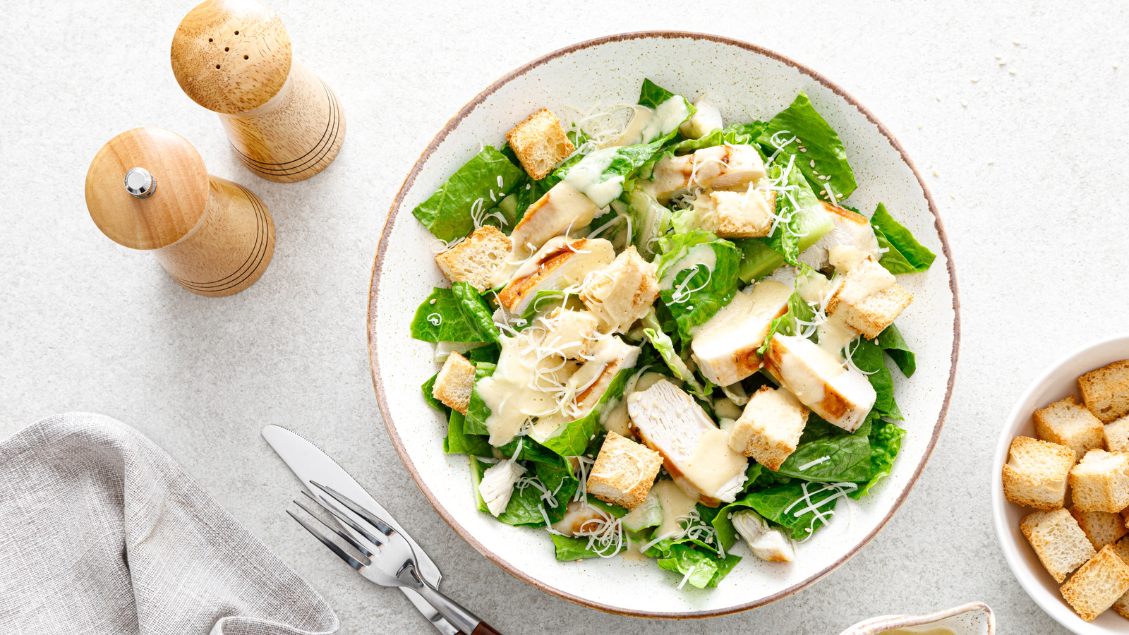 The Absolute Best Way To Cook Any Meat Before Adding It To Caesar Salad