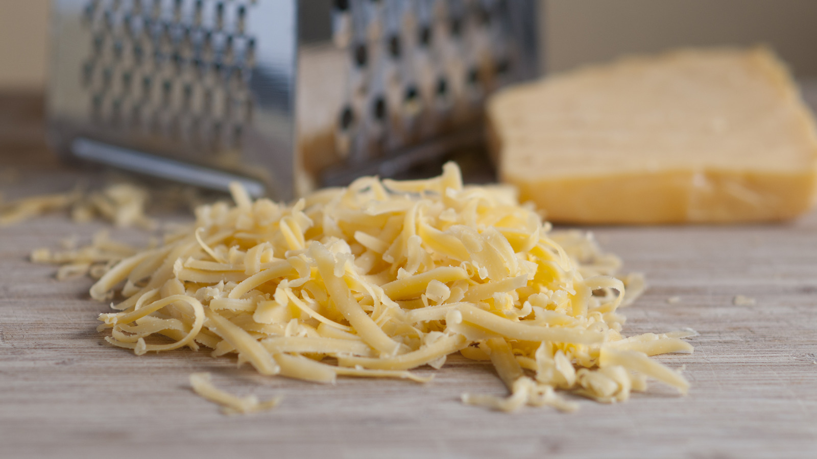 The Simple Cheese Grating Technique That's Much Safer For Your Knuckles