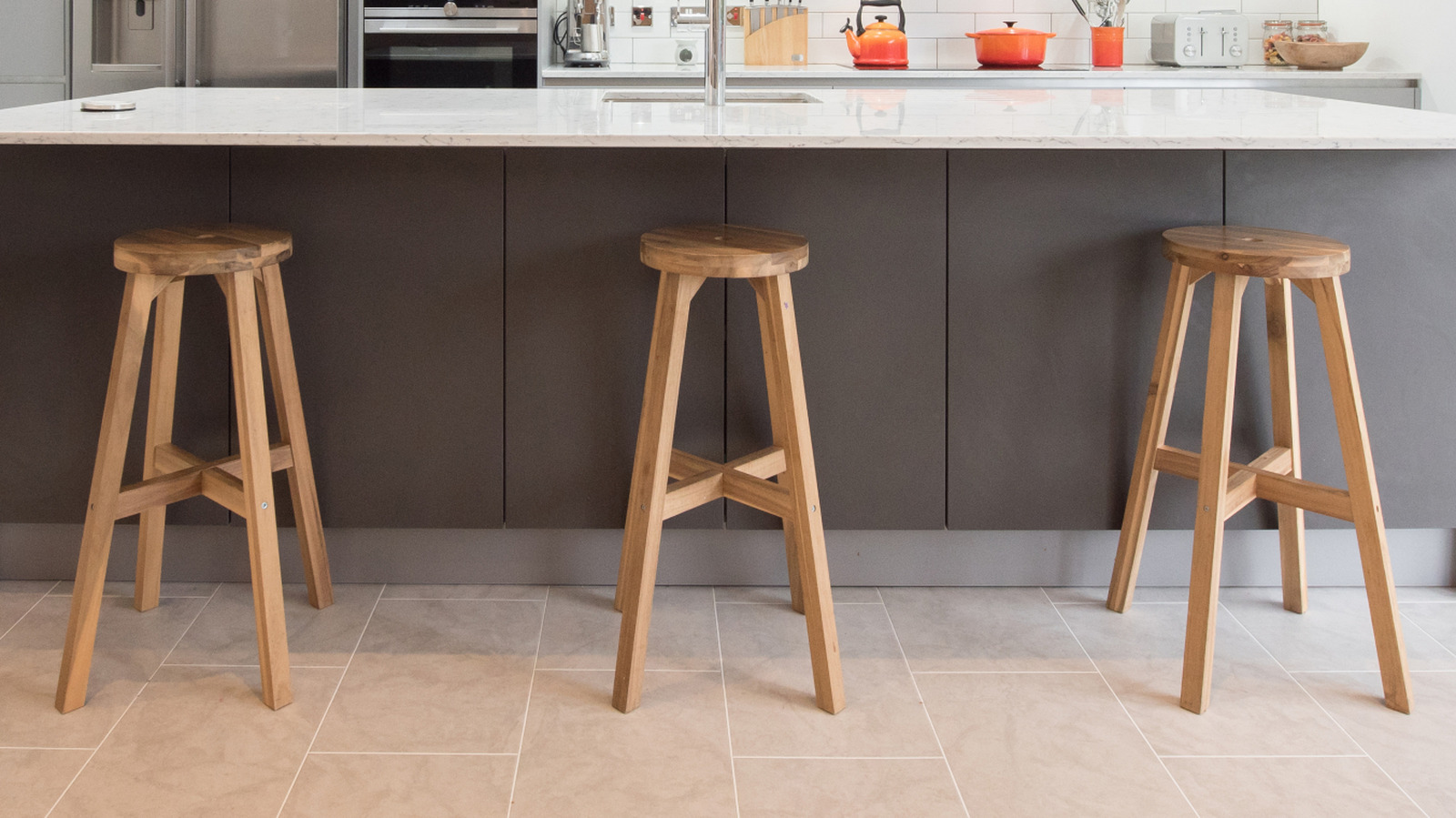 The Clever Way To Repurpose Old Bar Stools In Your Kitchen Or Garden