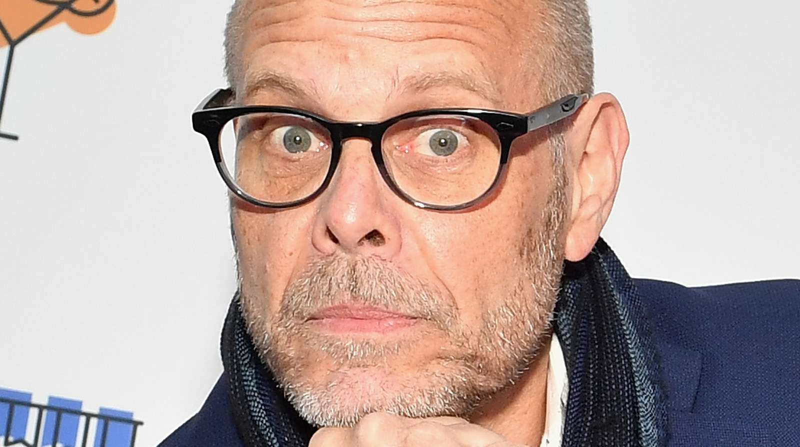 The Flirty Reason Alton Brown Really Got Into Cooking