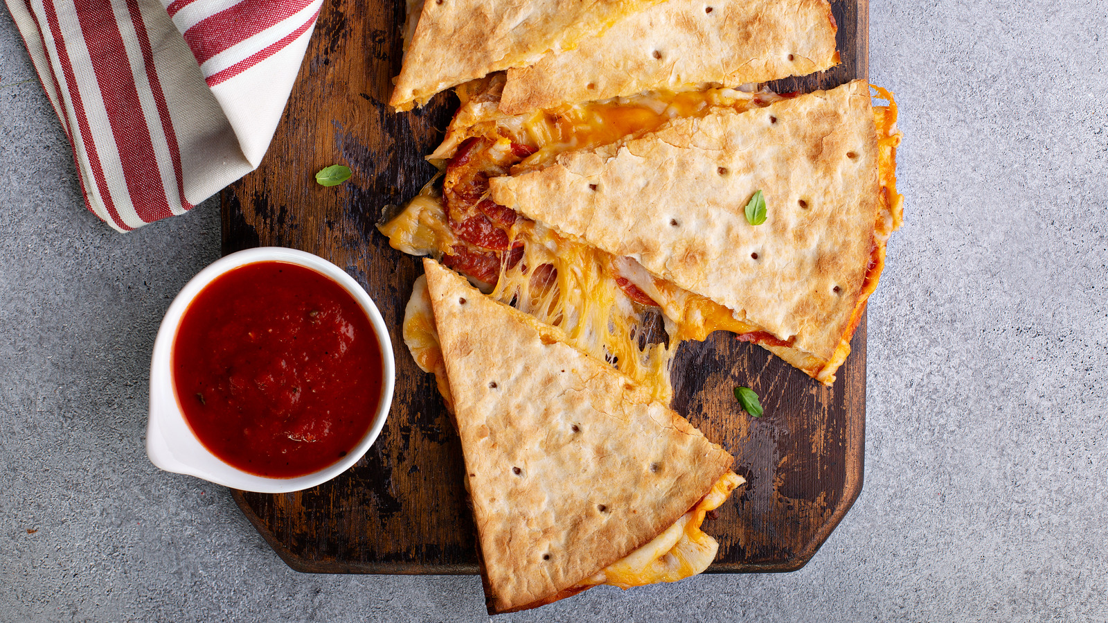 The Possible Reason Your Pizza Quesadilla Turned Into A Soggy Mess