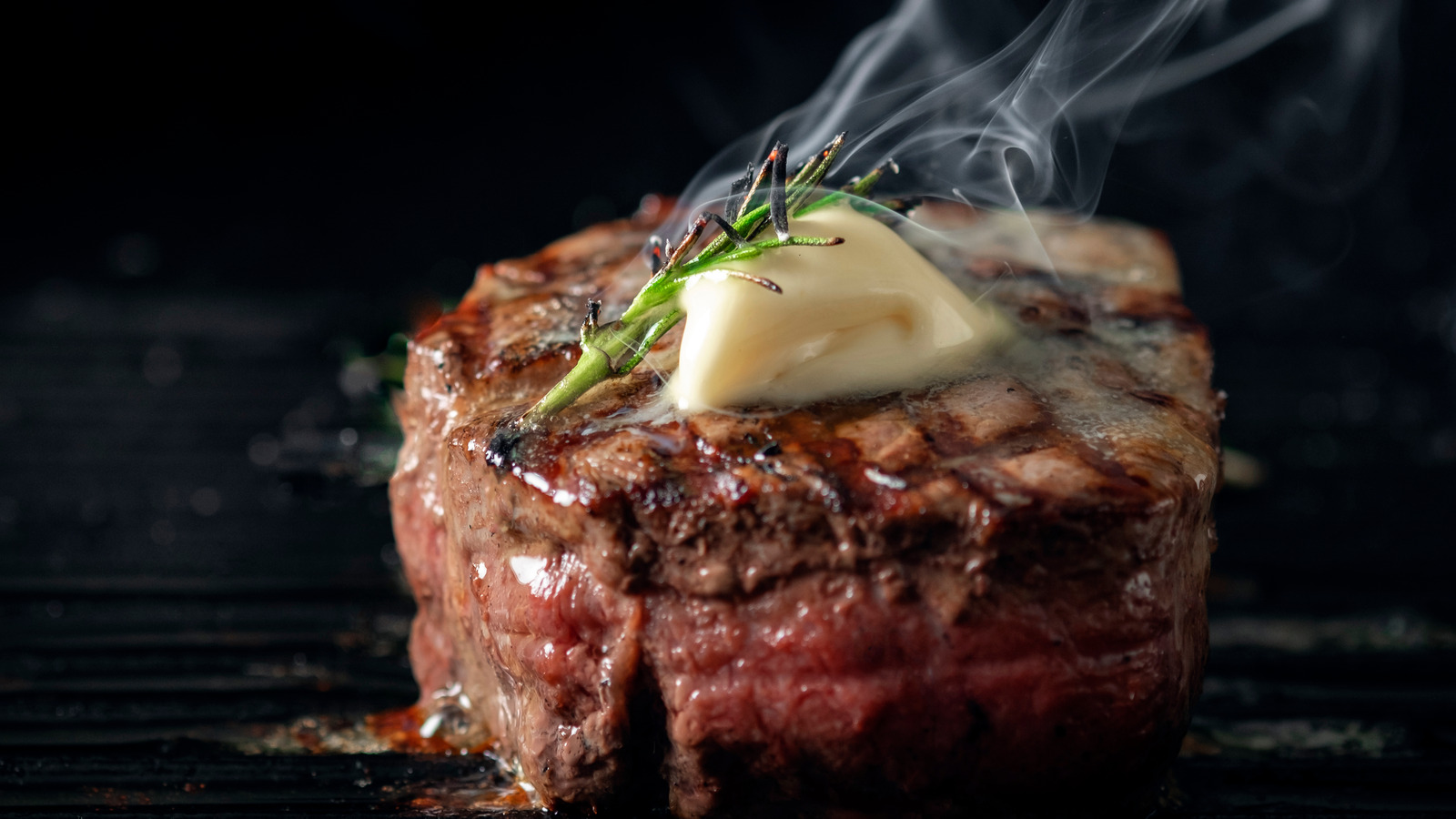 The Reason Steakhouses Use Super High Heat