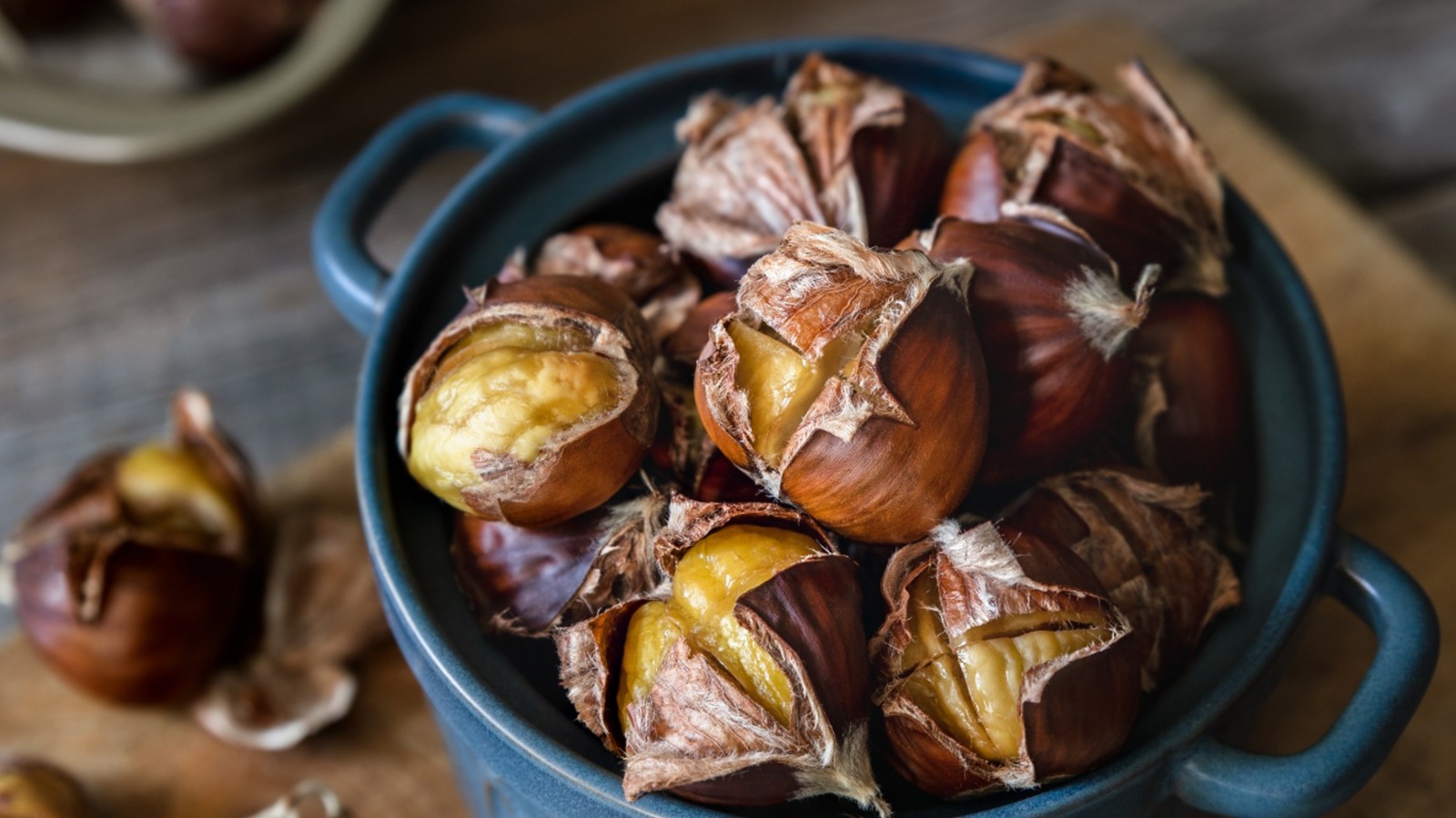The Reason You'll Want To Score Chestnuts Before Roasting