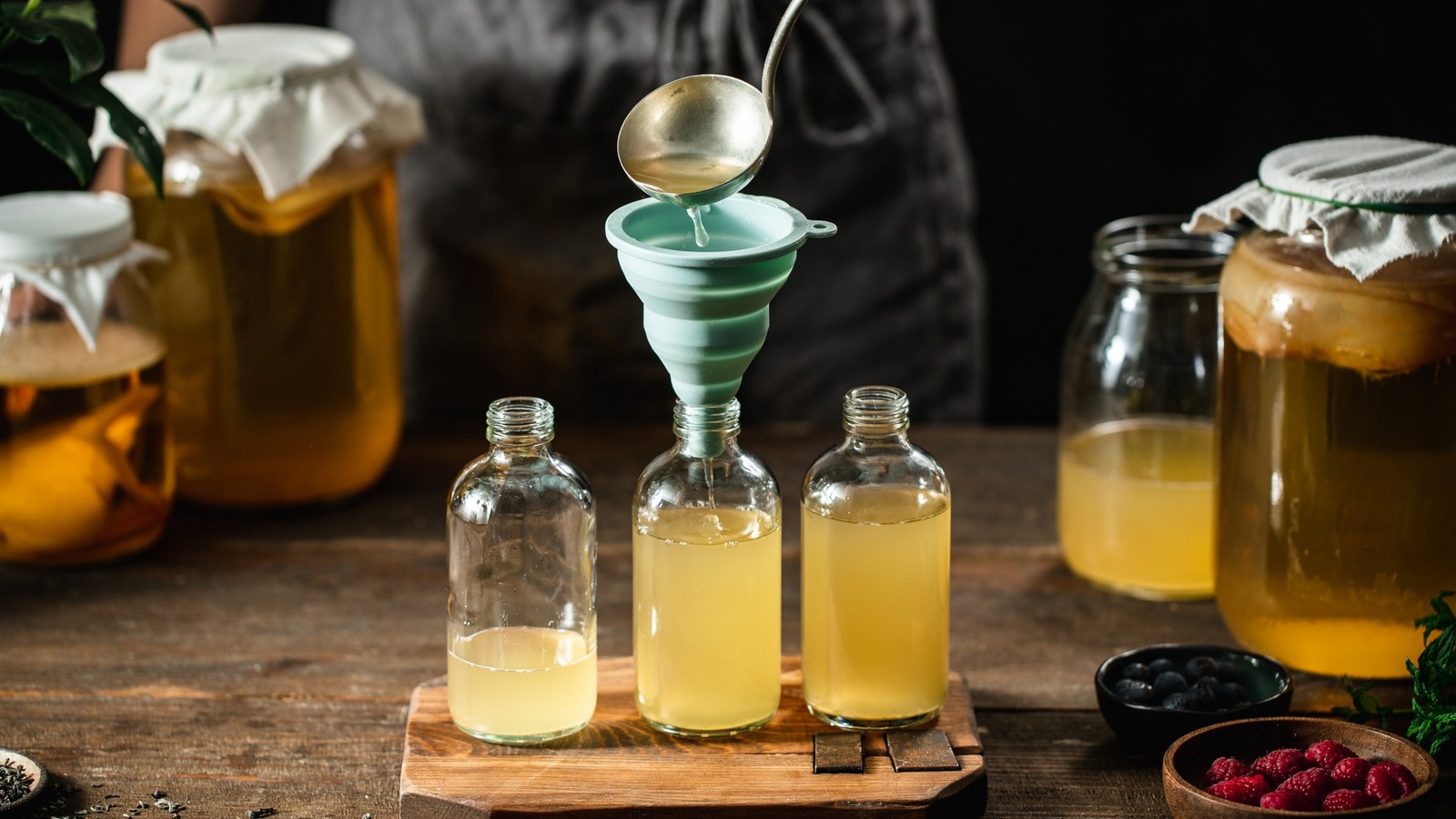 The Simple Water Bottle Hack For Funneling Foods Without Spillage