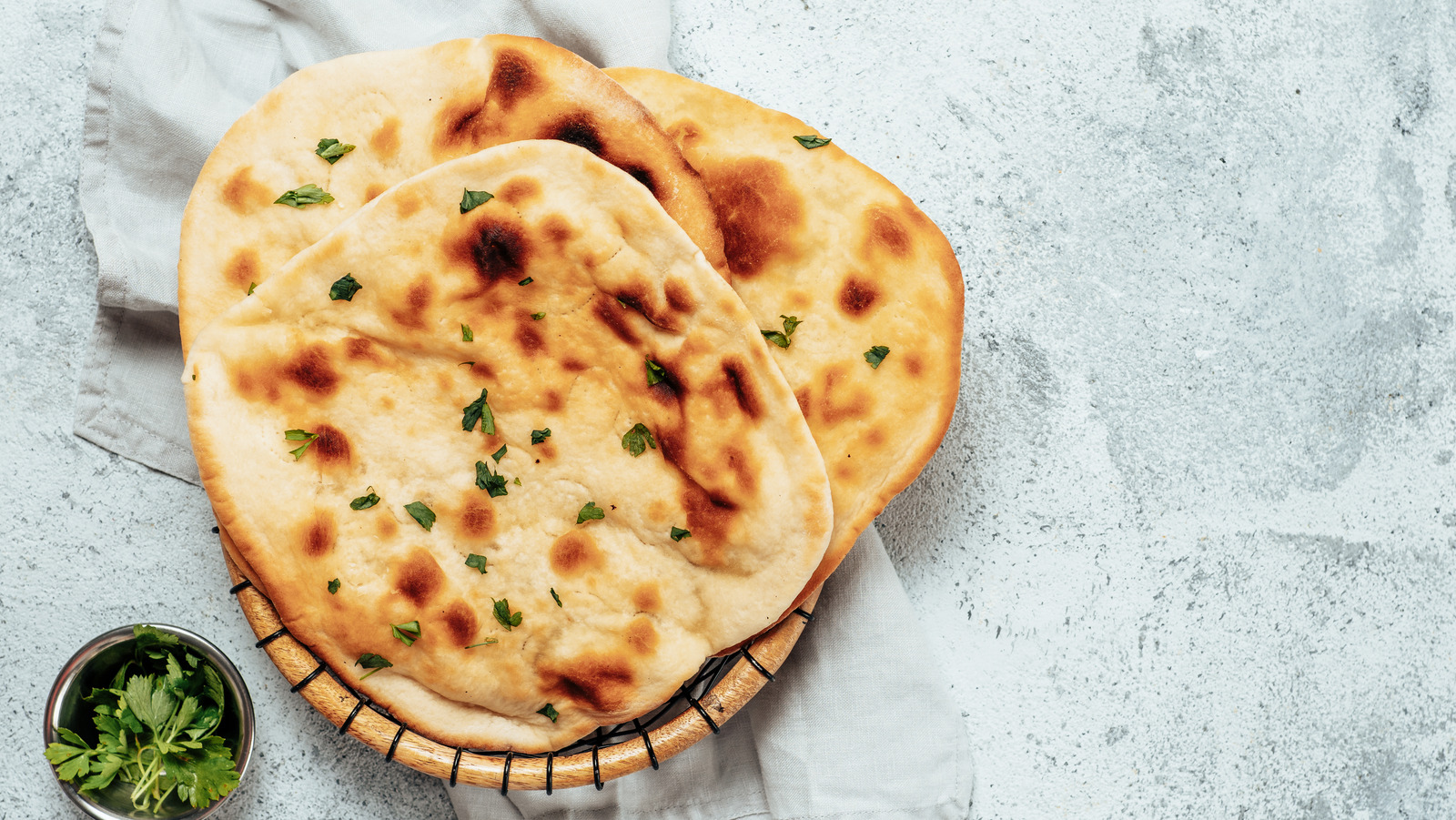 The Tip To Know When It's Time To Flip While Cooking Naan