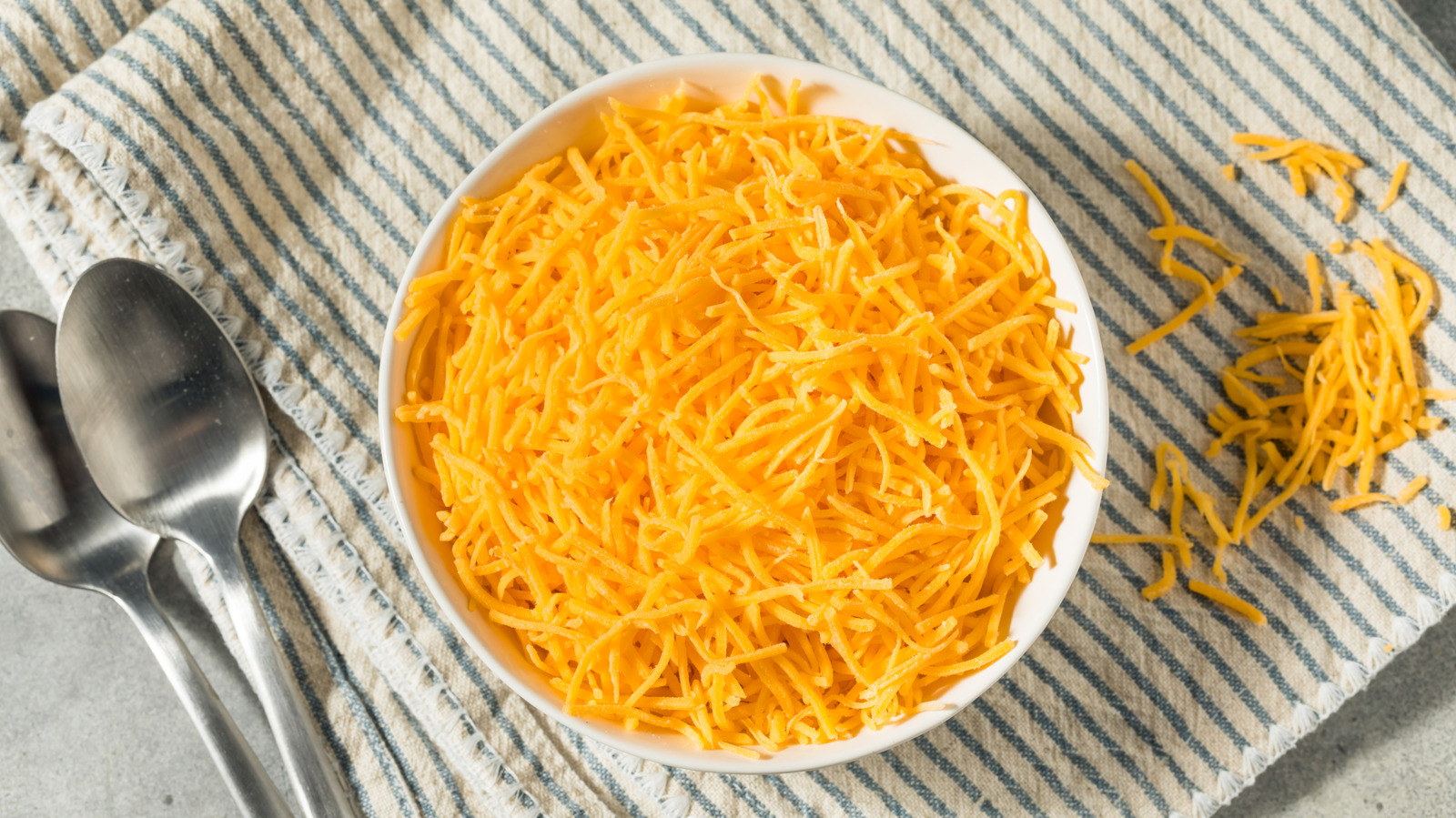 The Worst Store-Bought Shredded Cheese Comes From This Popular Grocery ...