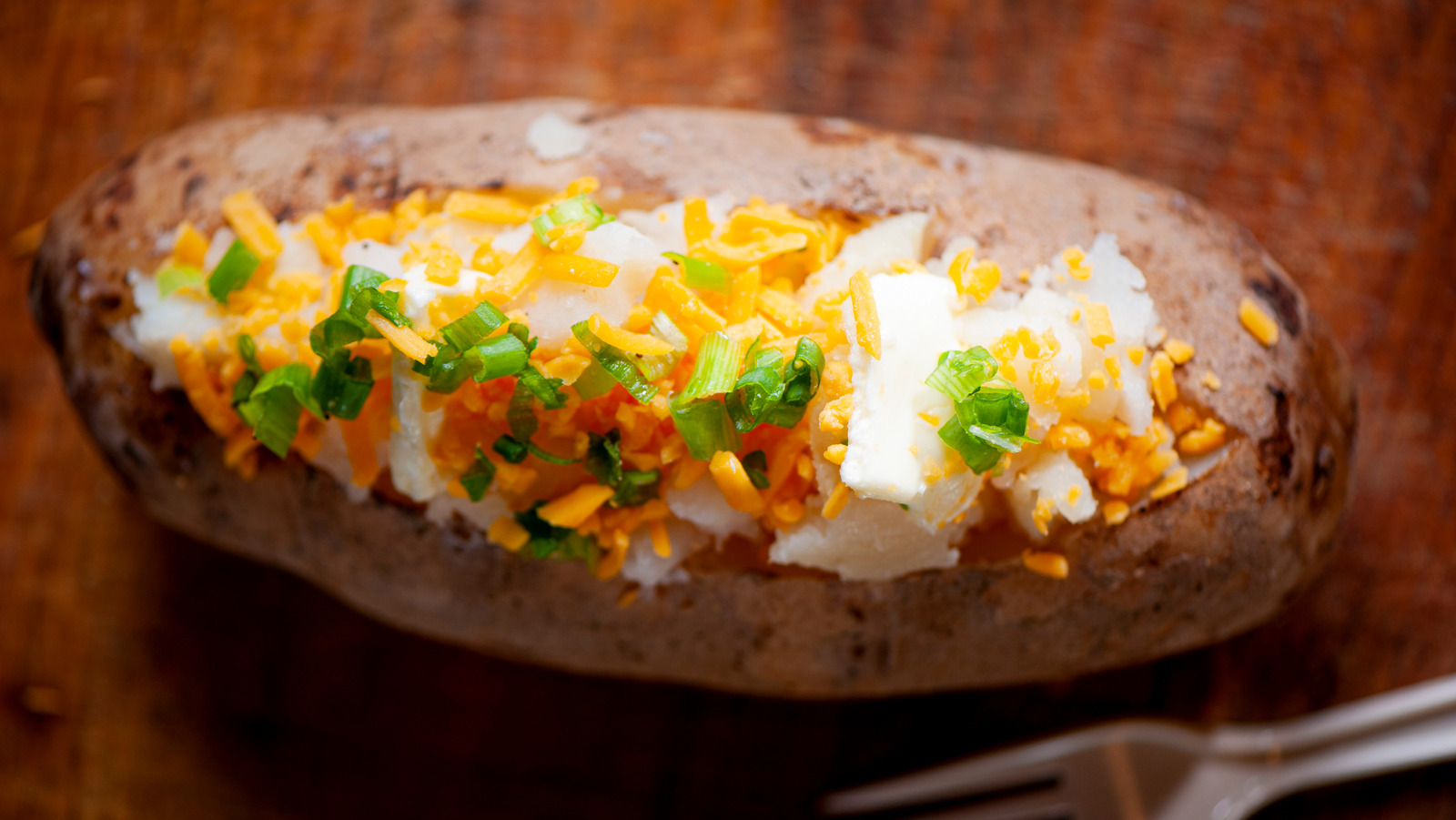 Why Baked Potatoes Taste Better In Restaurants Than At Home