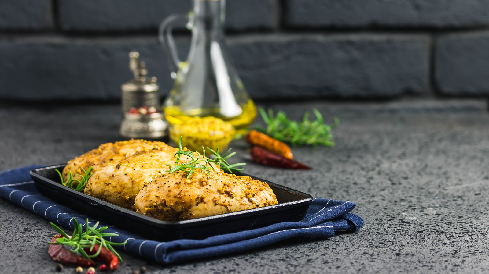 Why It Pays To Prep Chicken With A Slathering Of Mustard